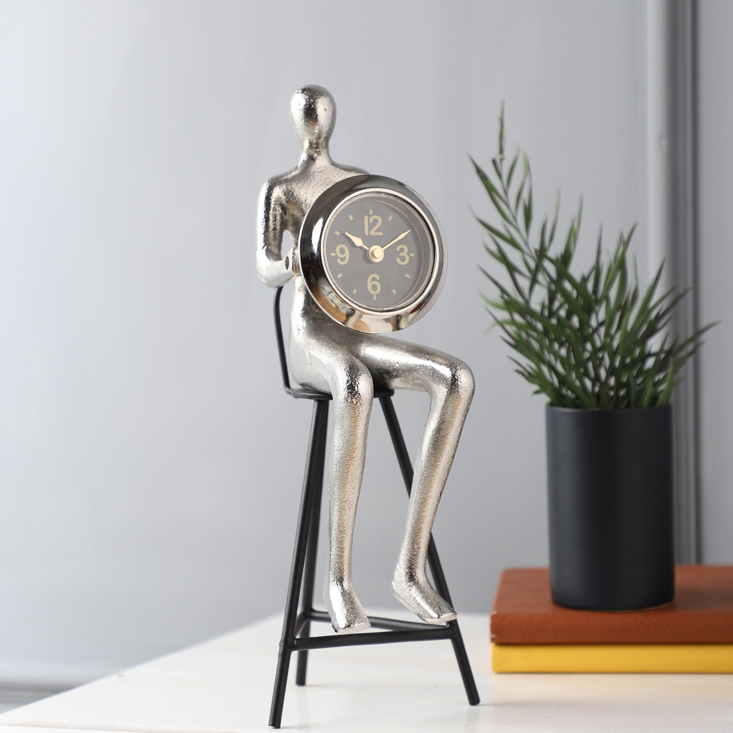Antique Black Metallic Modern Sitting Man Table Clock For Living Room ...